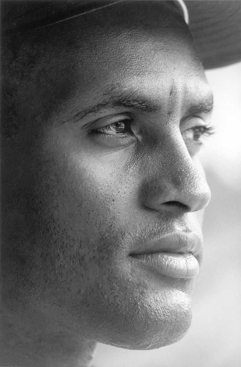 Roberto Clemente, Portrait Before Game | Neil Leifer Photography