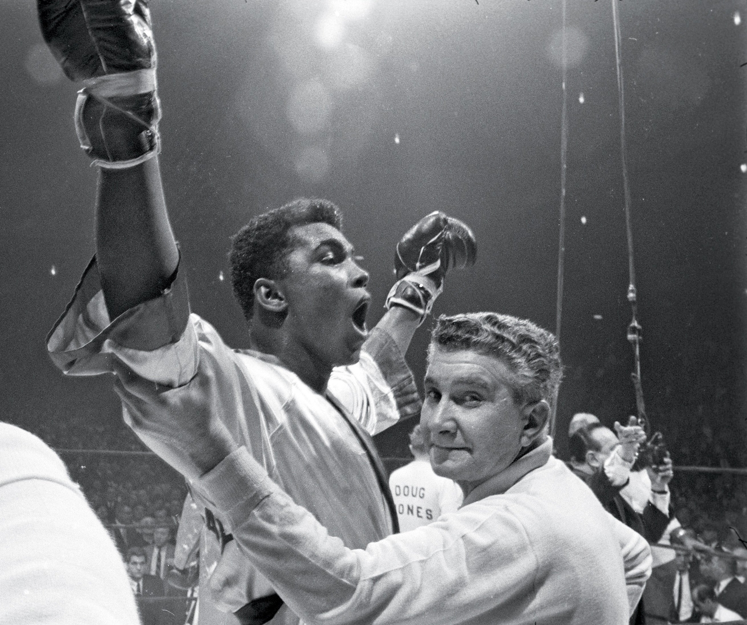 Clay vs Jones, Post-fight - Chickie Ferrara Holding Ali's Arm Up | Neil ...
